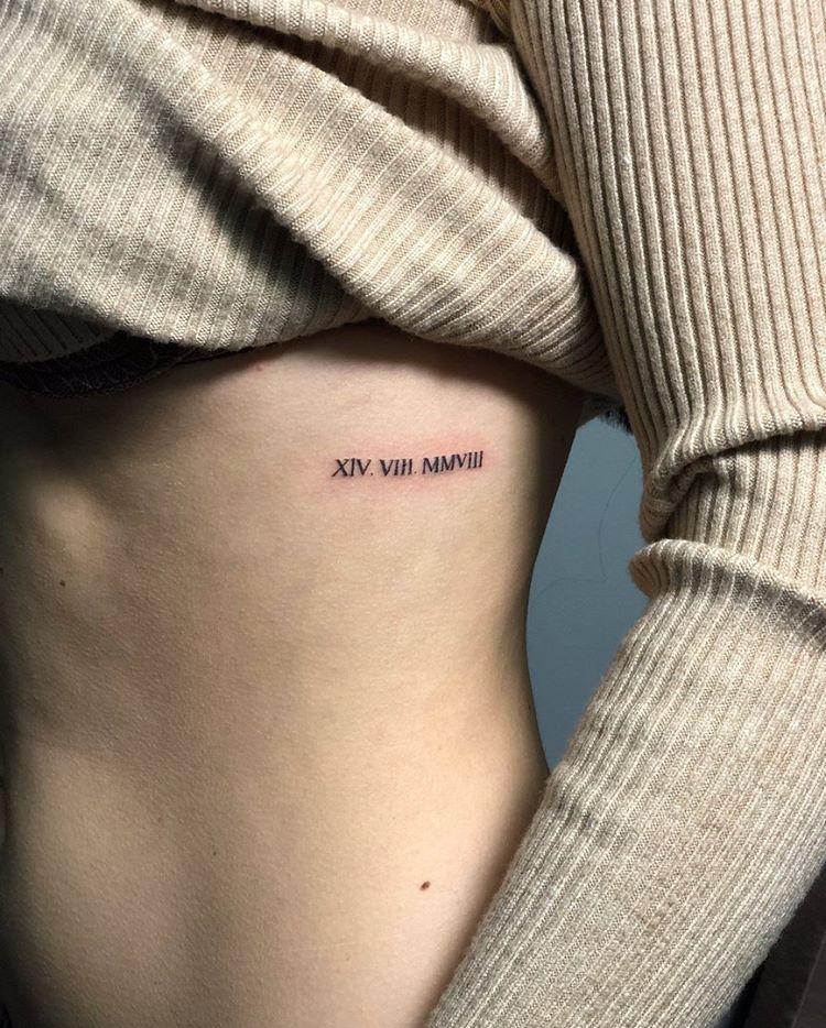 Roman Numeral Date Tattoo On The Rib Cage Tattoogrid Roman Numeral Date Tattoo On The Rib Cage Tattoogrid