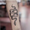 Cosmic energy snake tattoo - Tattoogrid.net