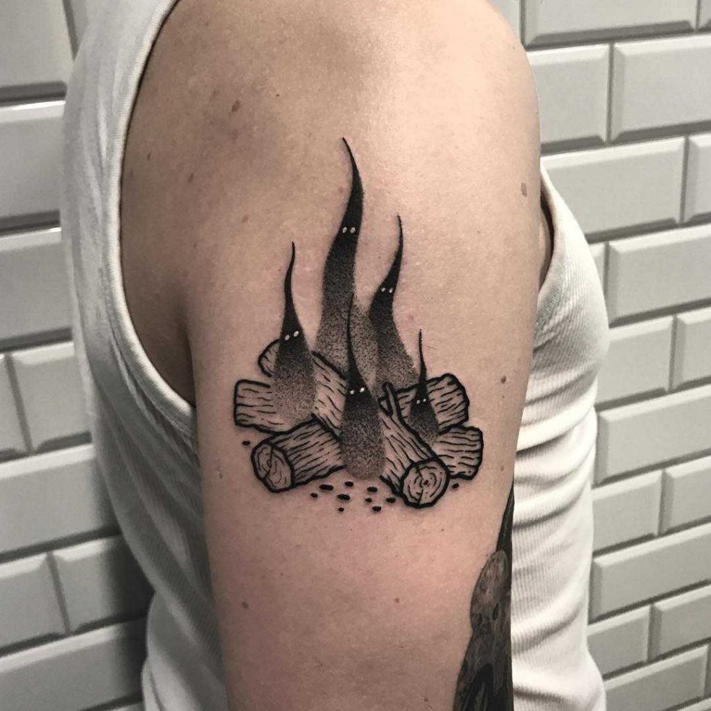 Hand with a fire tattoo - Tattoogrid.net