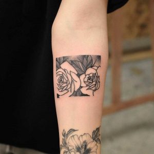 Two crossed roses tattoo - Tattoogrid.net