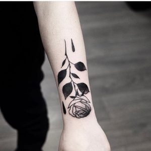 Negative space flower tattoos - Tattoogrid.net