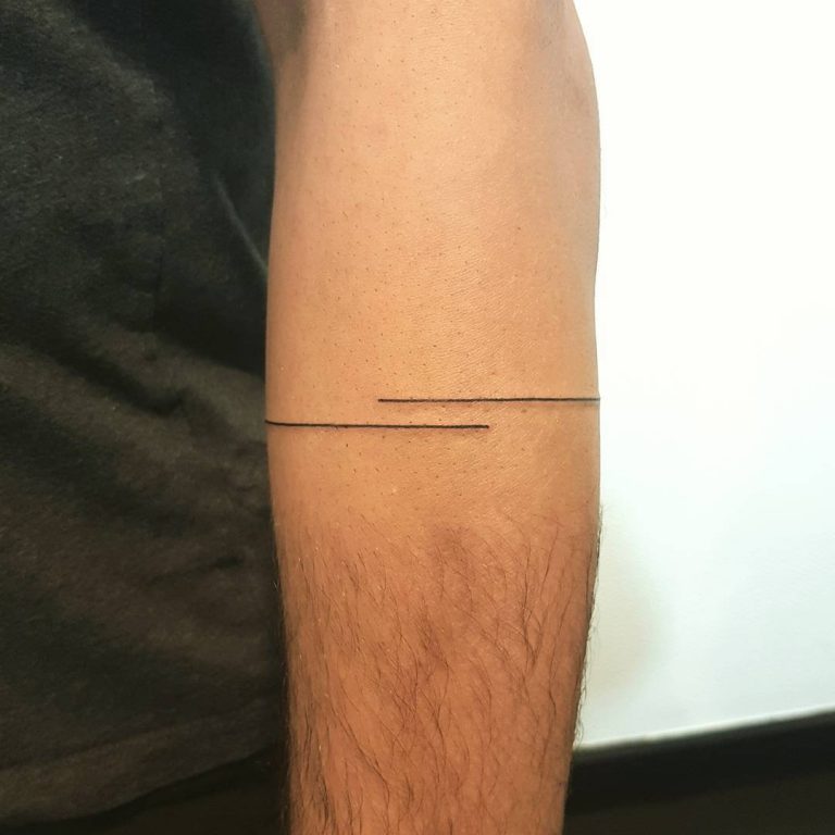 Simple and minimalist arrow tattoo on the forearm - Tattoogrid.net