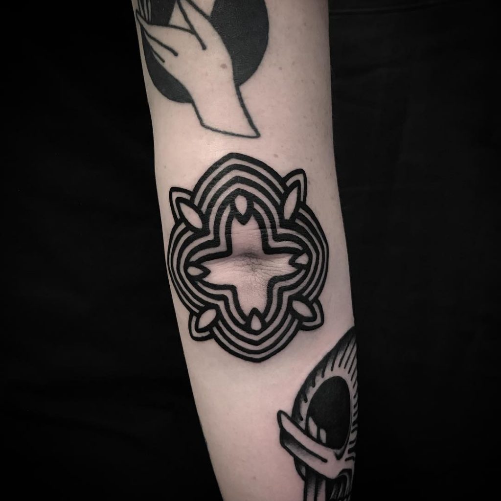 Wreath and geometric shapes tattoo - Tattoogrid.net