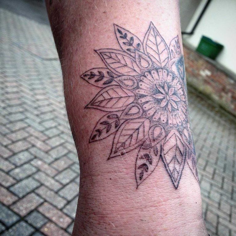 Large mandala tattoo on the left rib - Tattoogrid.net