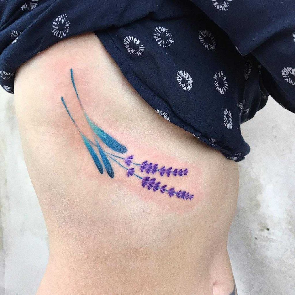 Geometric iceberg tattoo on the rib cage - Tattoogrid.net