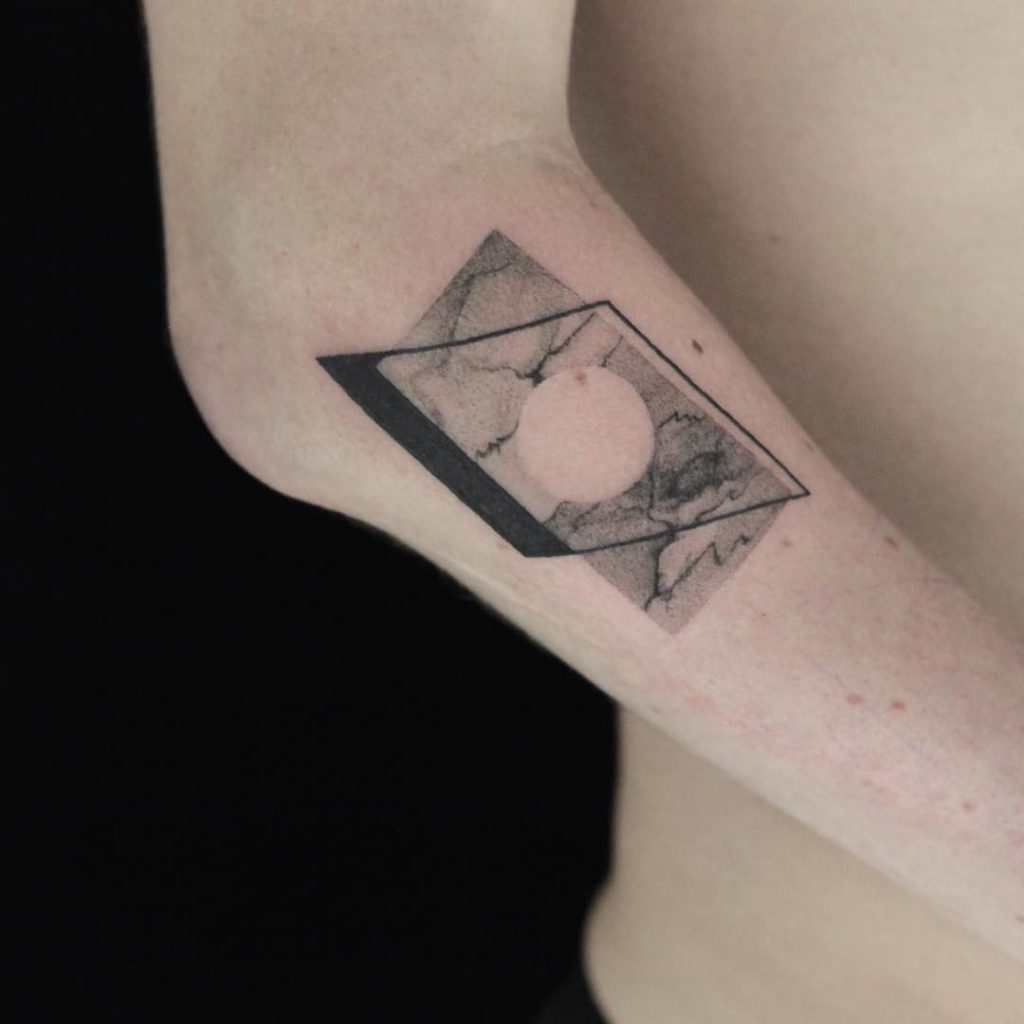 Custom space and geometry tattoo - Tattoogrid.net