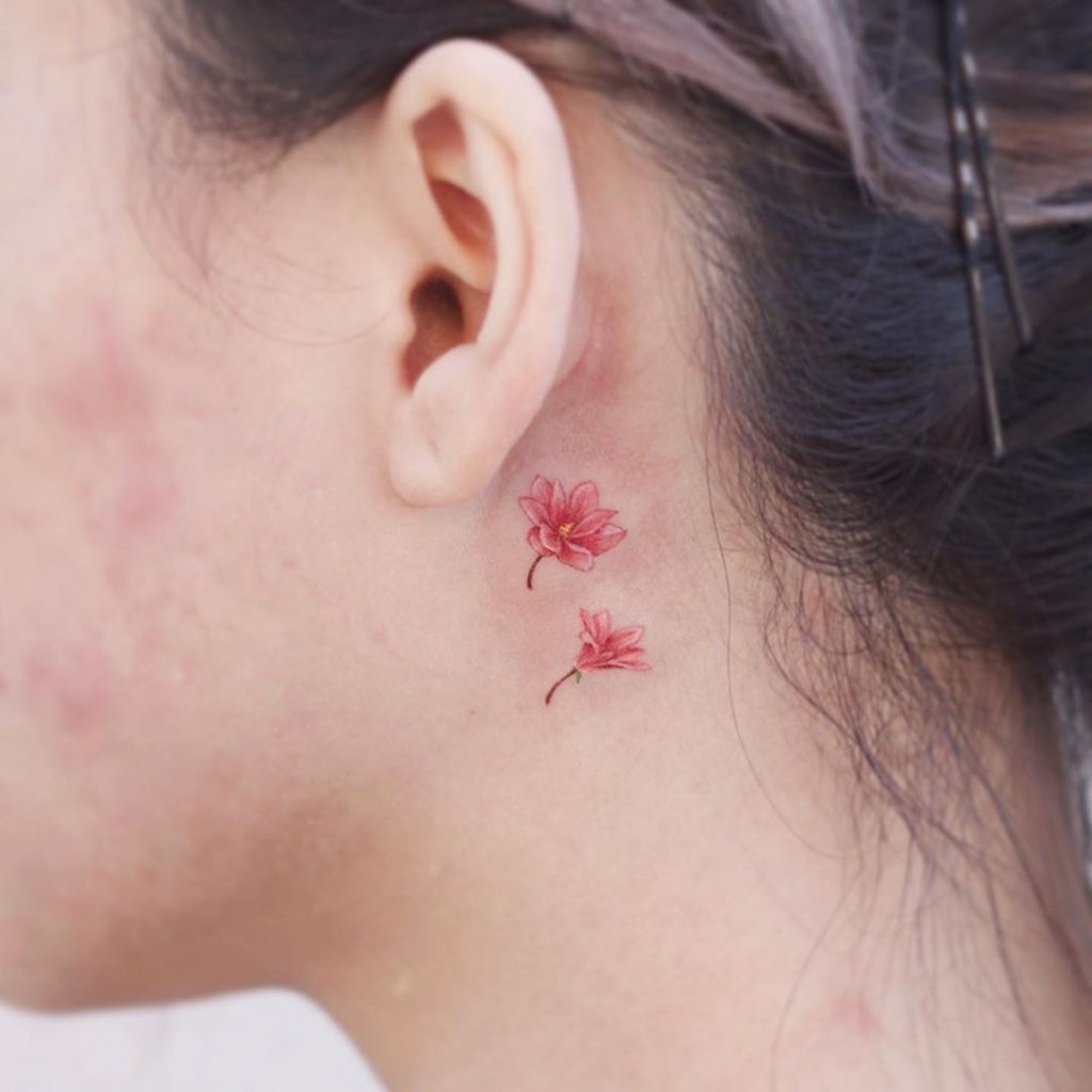 Bird in a triangle neck tattoo - Tattoogrid.net