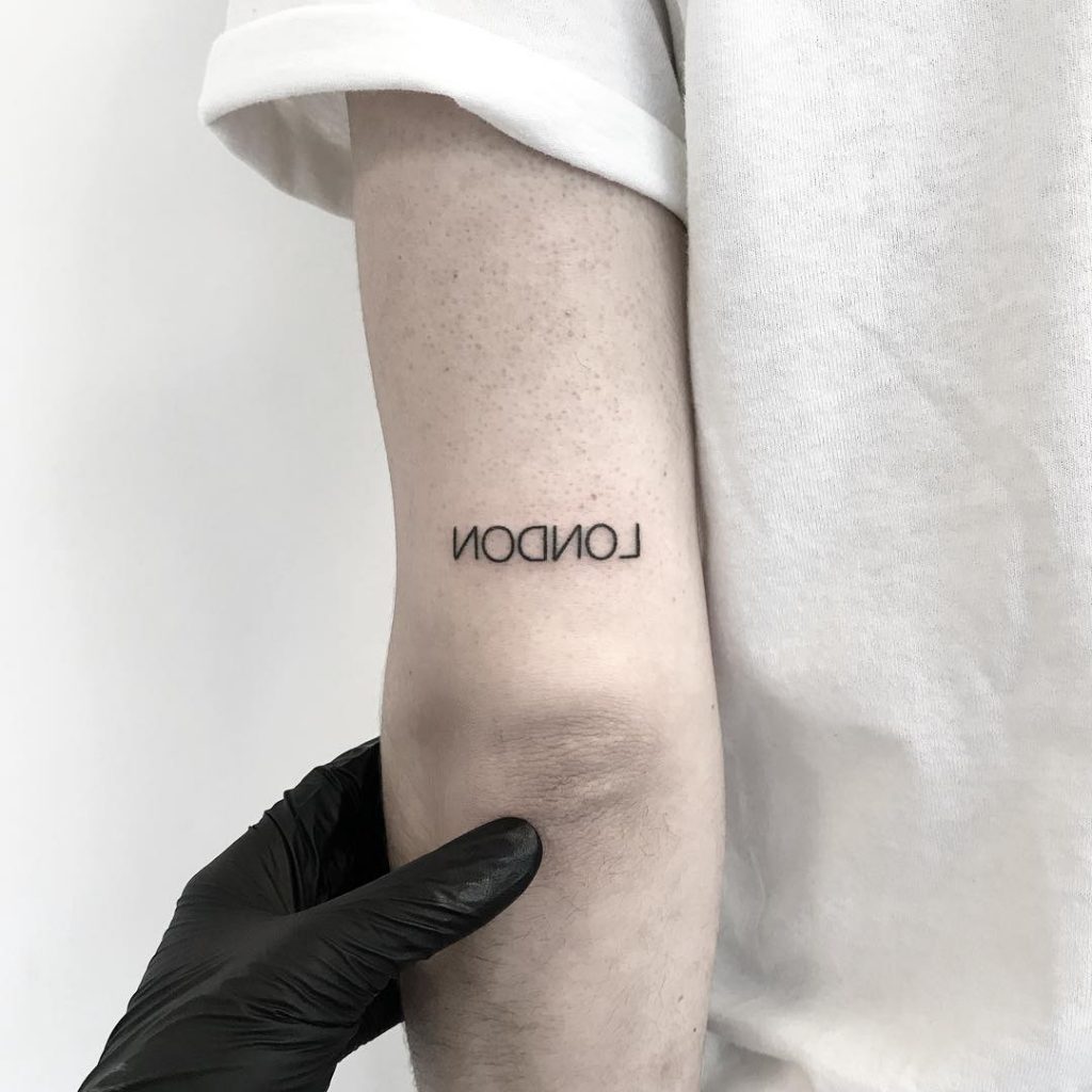 Korean writing tattoo by Mumi Ink - Tattoogrid.net