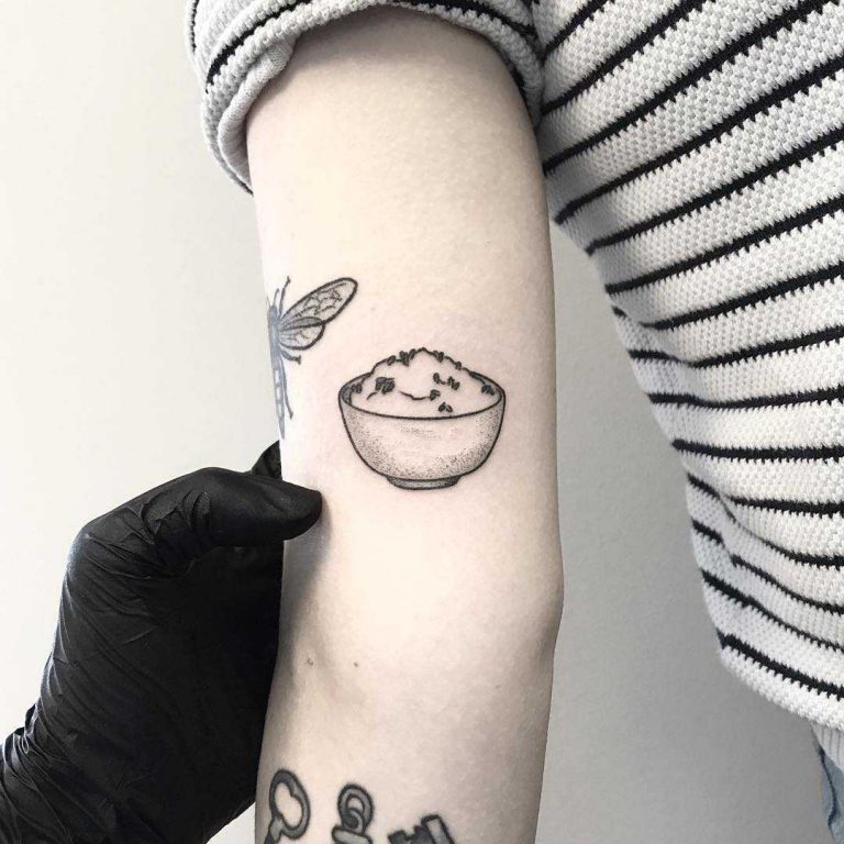 Minimalist cross tattoo on the arm - Tattoogrid.net