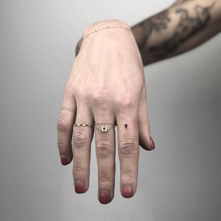 Hand-poked ring tattoo by Lindsay April - Tattoogrid.net
