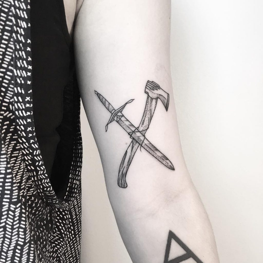 Abstract tattoo on the forearm - Tattoogrid.net