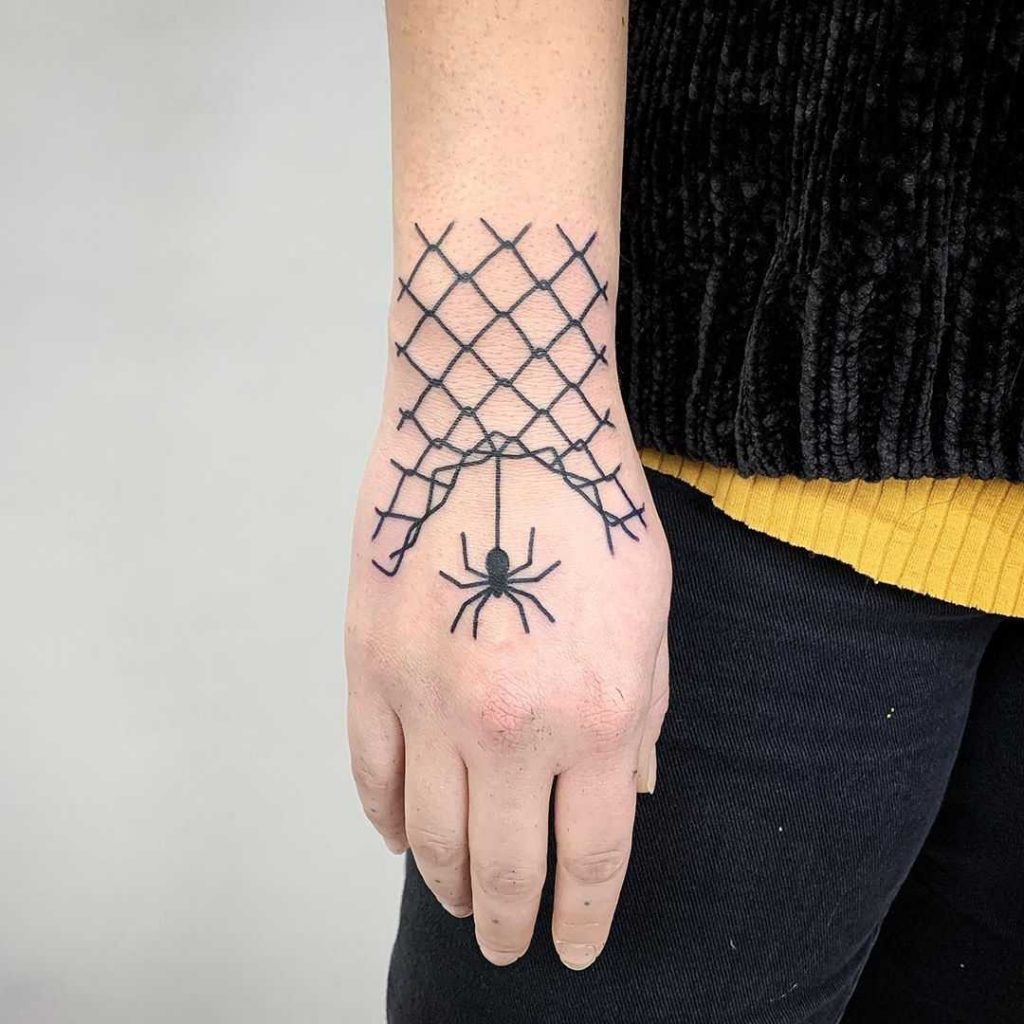 Fern leaves tattoo on the hand - Tattoogrid.net