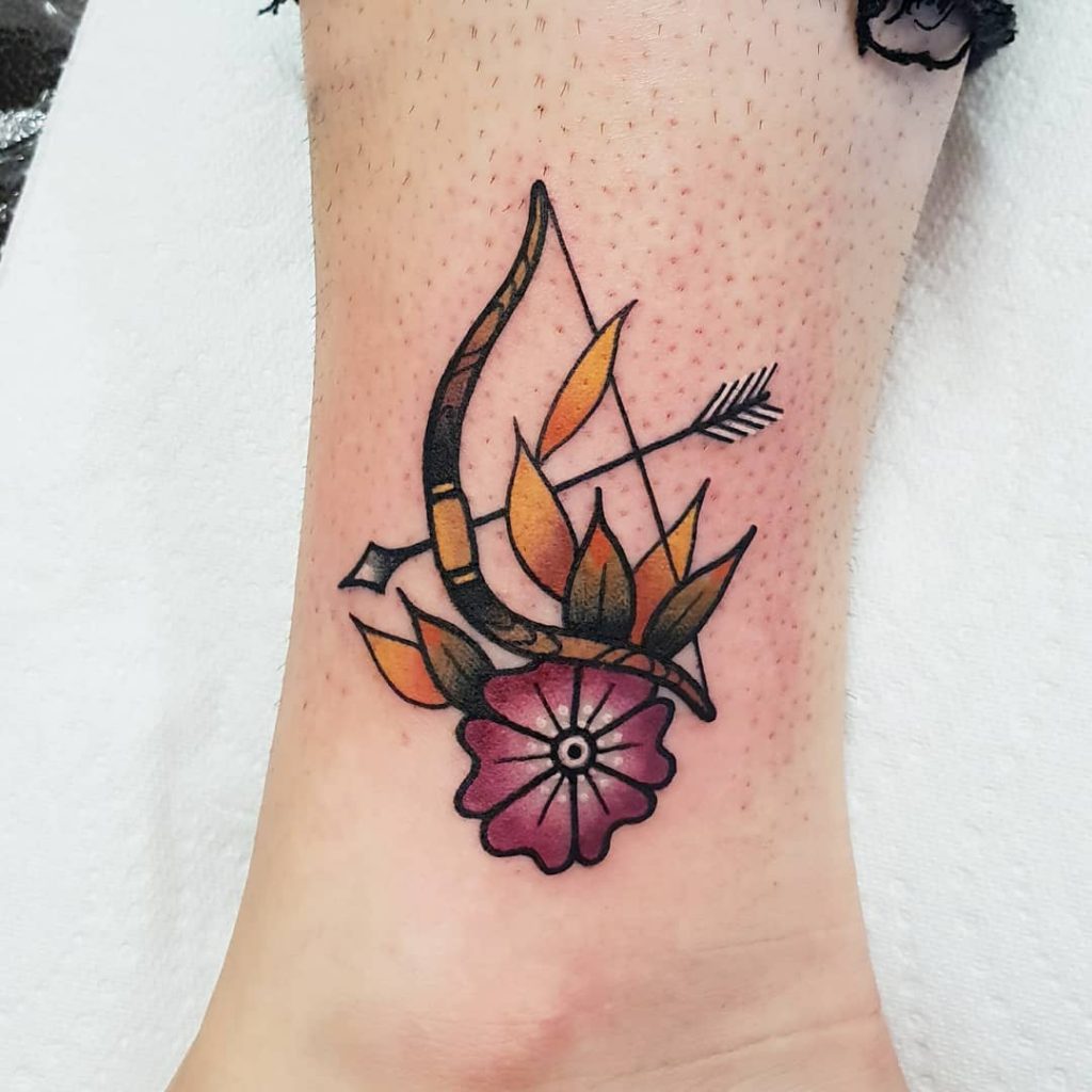 Snake handler tattoo - Tattoogrid.net