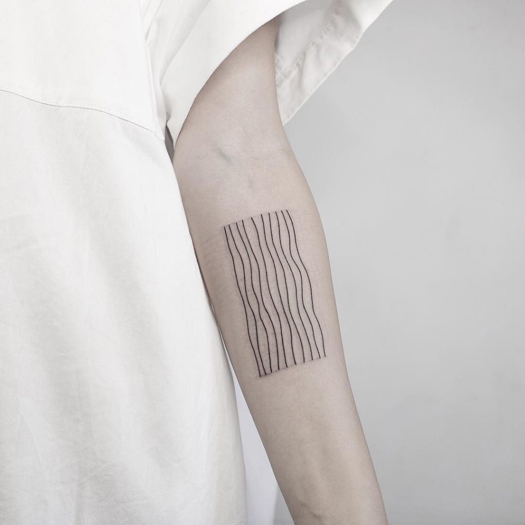 Delicate black outline tattoo on the right forearm - Tattoogrid.net